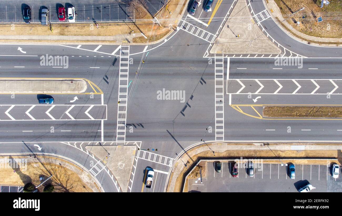 Aerial view of an intersection with vehicles Stock Photo - Alamy