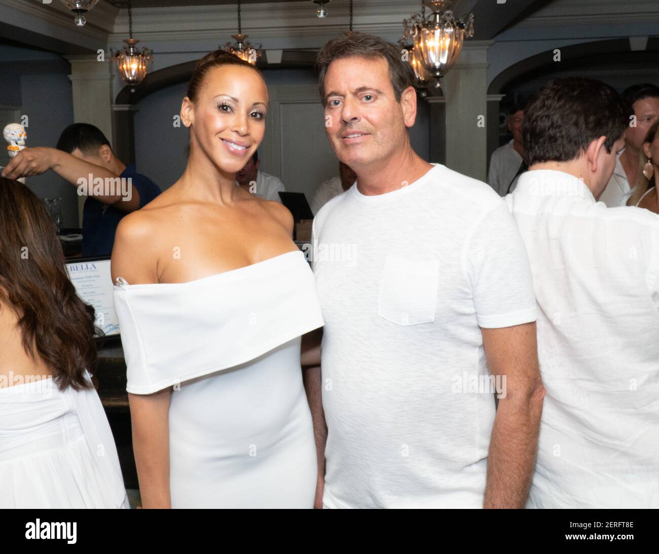 Jeannetta R Bagly and Elliot Heller attend the Bella Magazine White ...