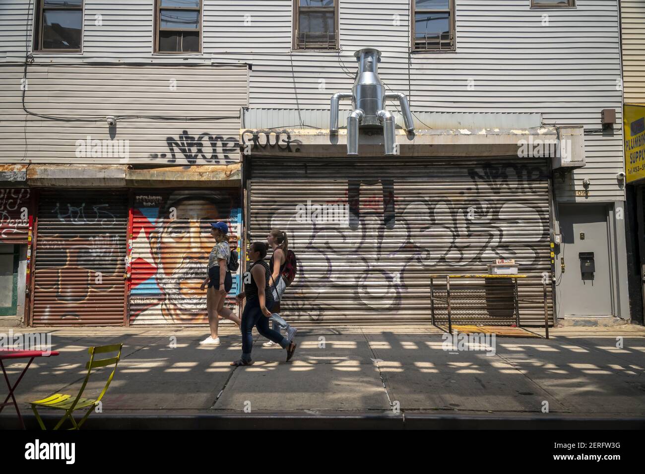 Closed business decorated with a "Tin Man" on Broadway under the ...