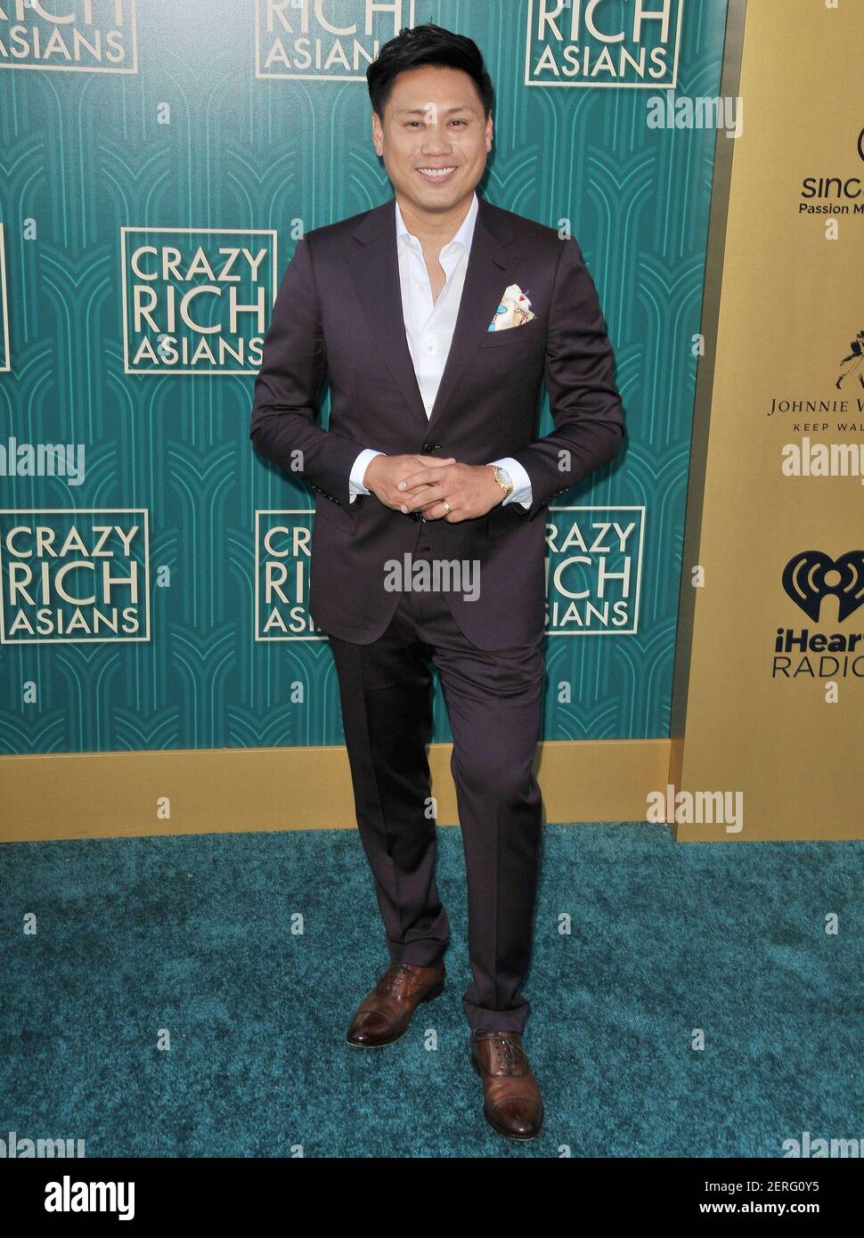 Director Jon M. Chu arrives at the “Crazy Rich Asians” Los Angeles ...