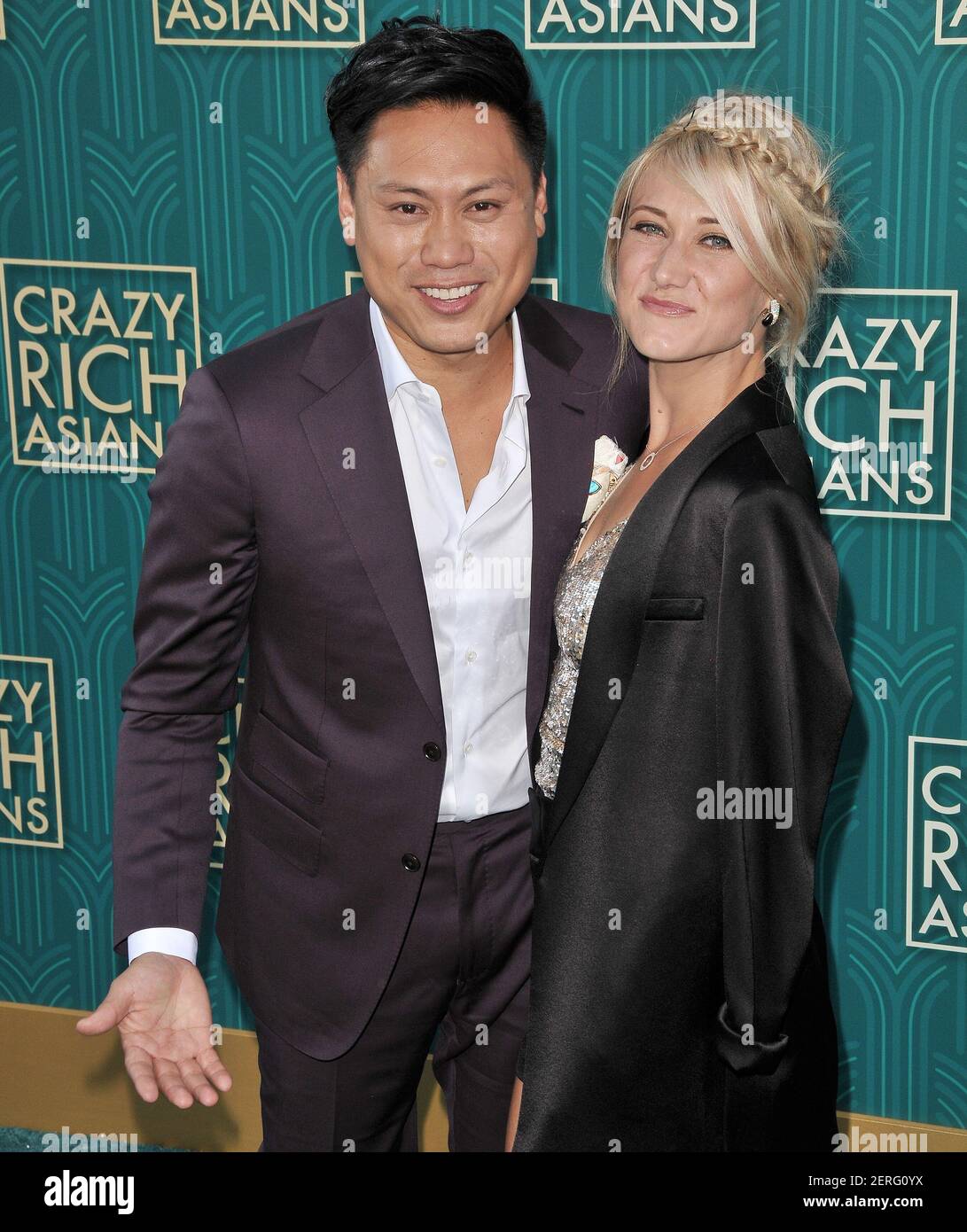 (L-R) Jon M. Chu and Wife Kristin Hodge arrives at the “Crazy Rich Asians” Los Angeles Premiere ...