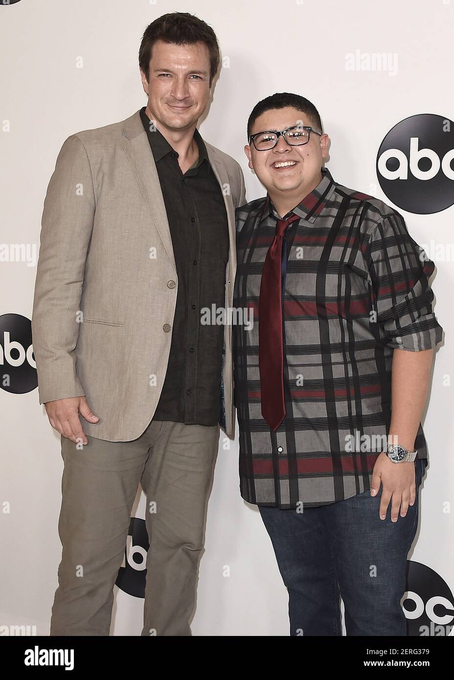 BEVERLY HILLS, CA - AUGUST 7: Nathan Fillion and Rico Rodriguez at the ...