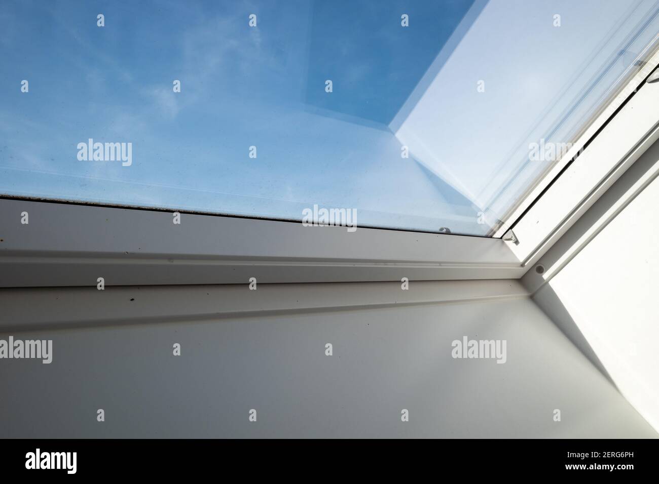 Interior view and close-up detail at closed white Tilt Window Skylights ...