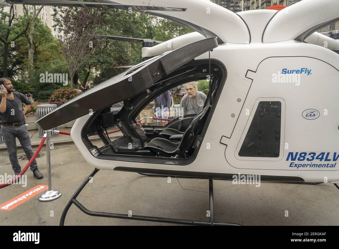 A Workhorse SureFly electric helicopter on display at a branding event ...