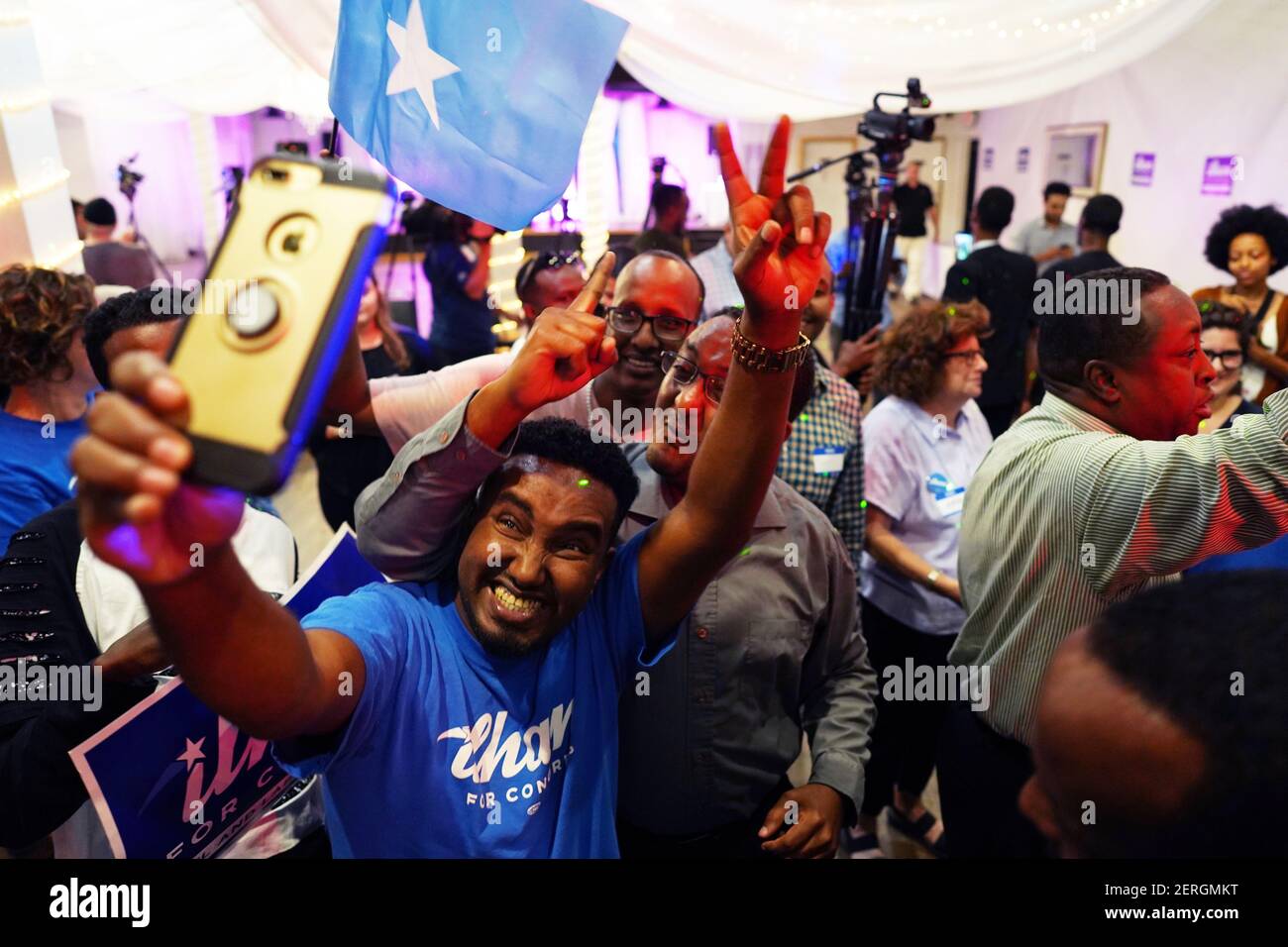 Supporters of congressional district five candidate Ilhan Omar gather ...