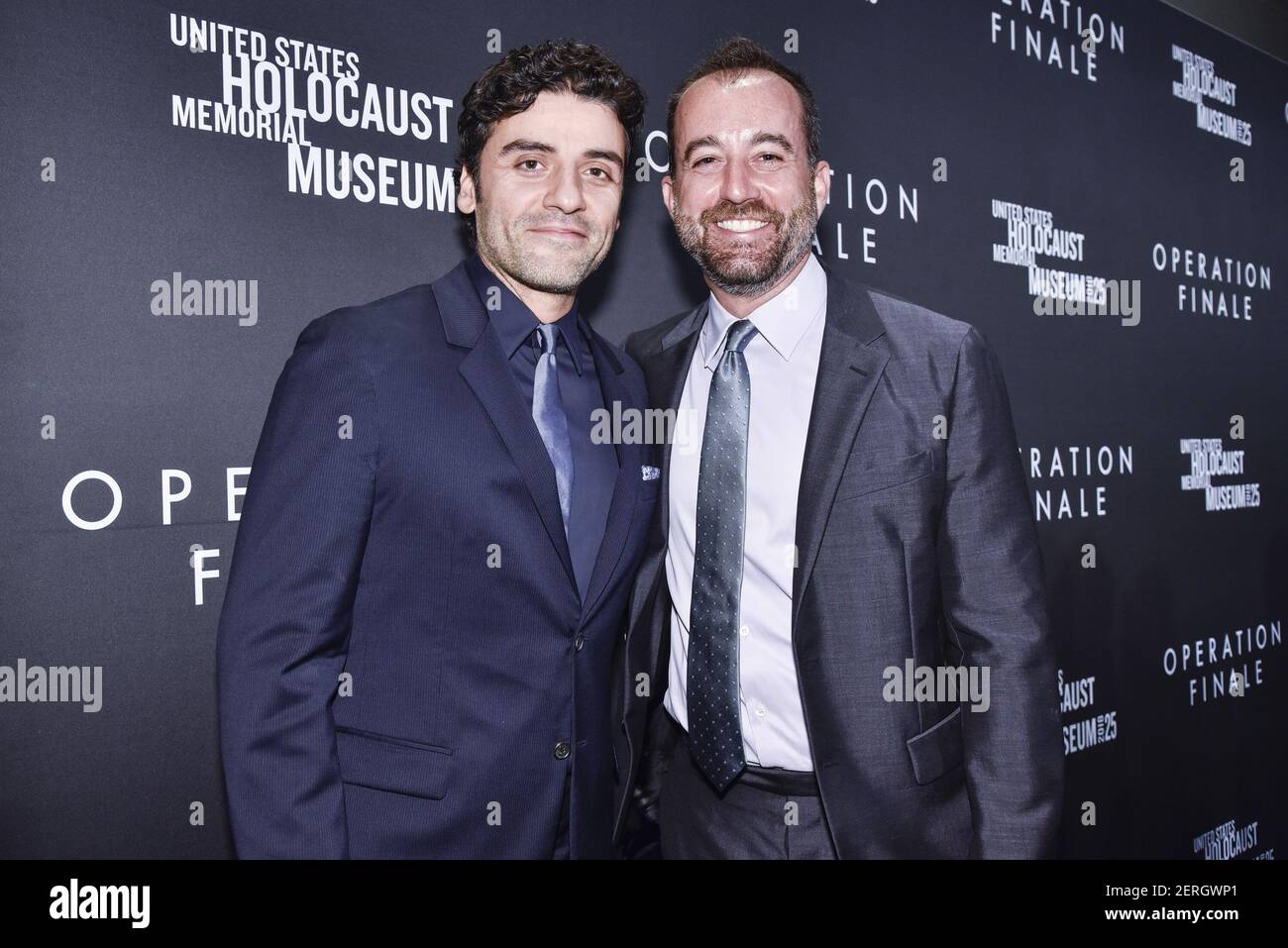WASHINGTON, DC AUG 15: Producer Jason Spire, and actor Oscar Isaac ...