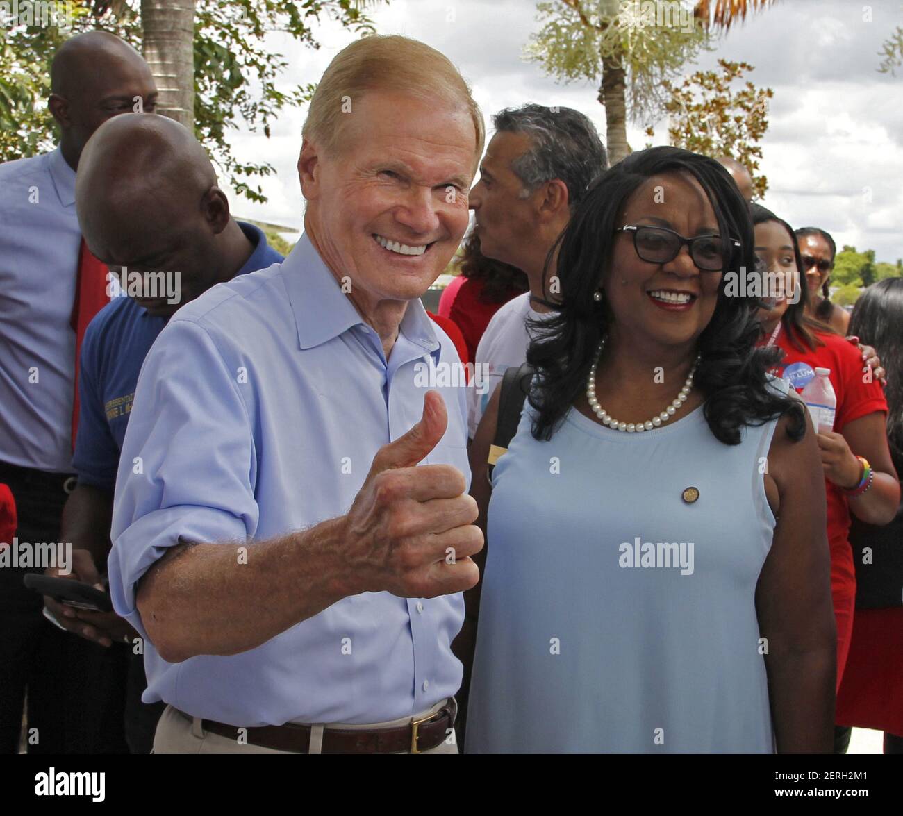 Sen. Bill Nelson, left, gives a thumbs-up as he and other Democrats ...