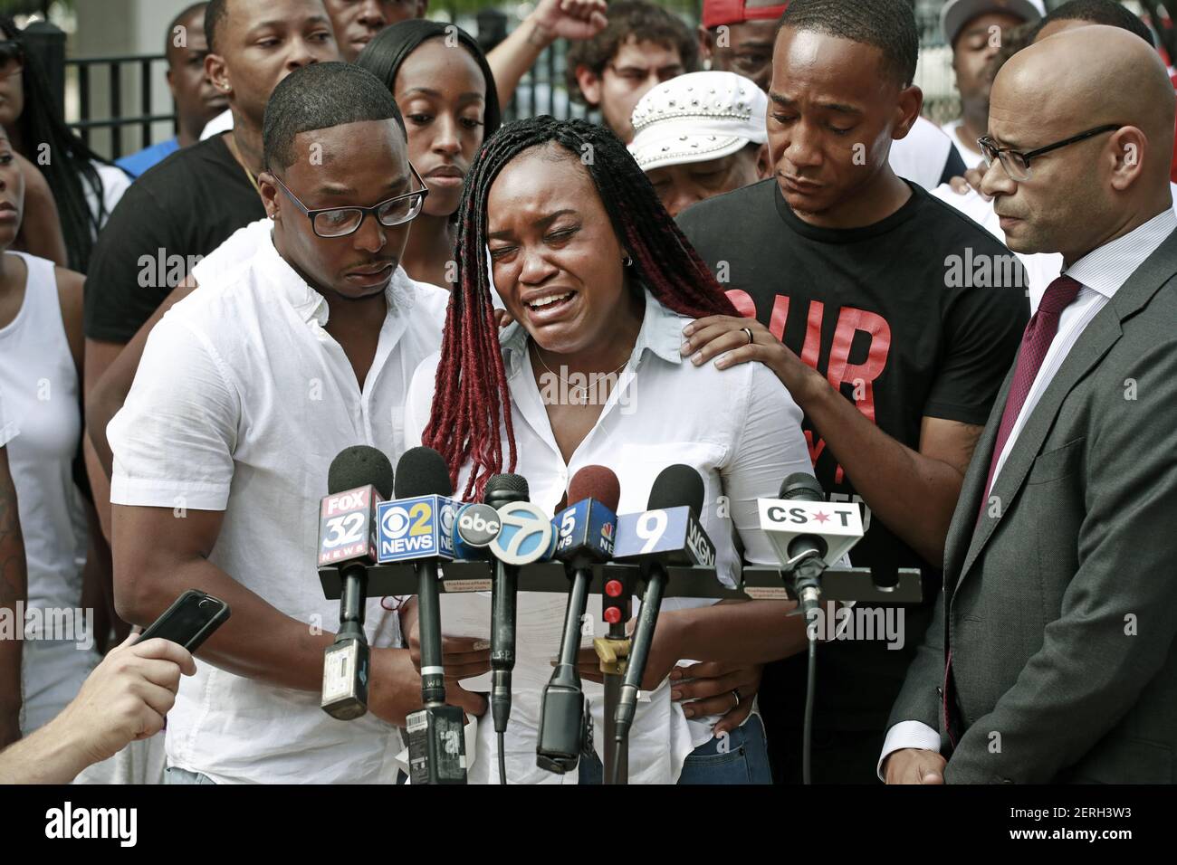 From left, Robert Level, his wife Terinica Thomas-Level, and her brother Dashaun Thomas, during ...