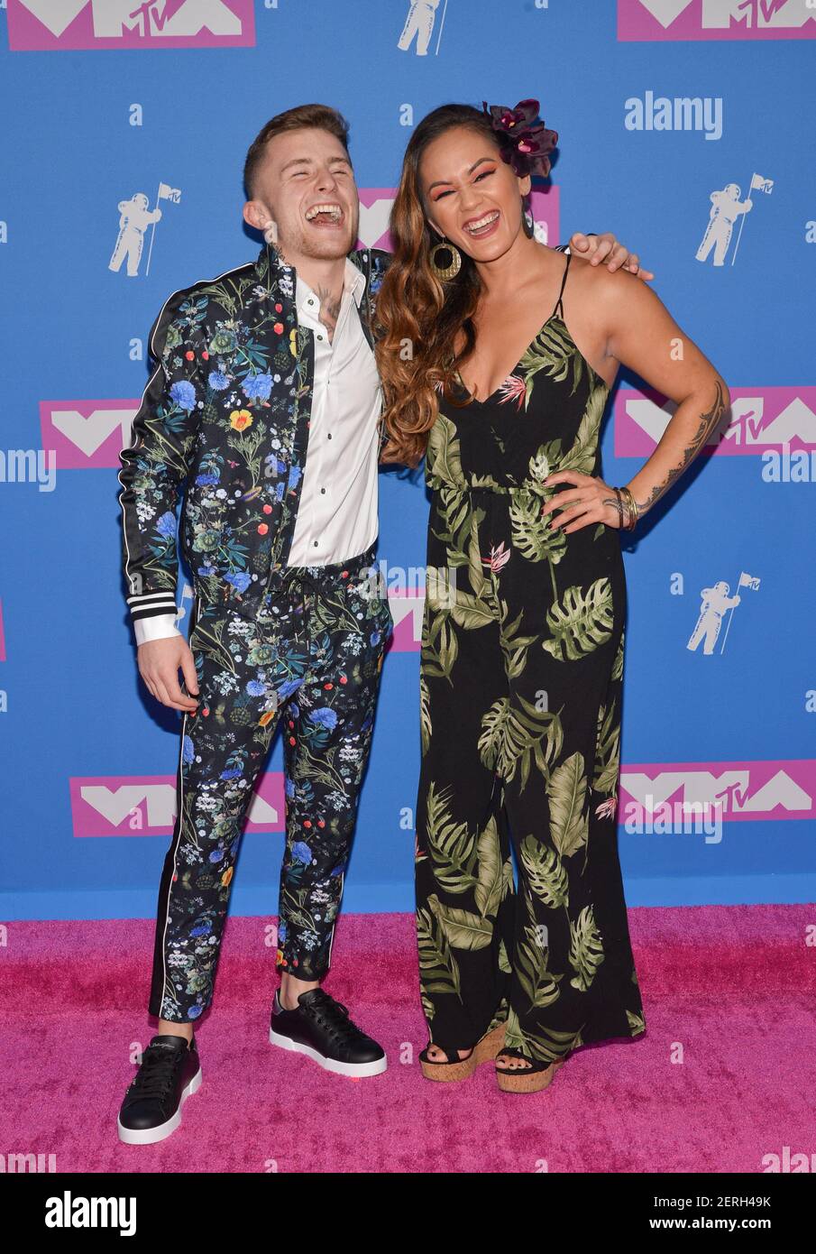 James Gallagher and Ilima-Lei Macfarlane walking on the red carpet at ...