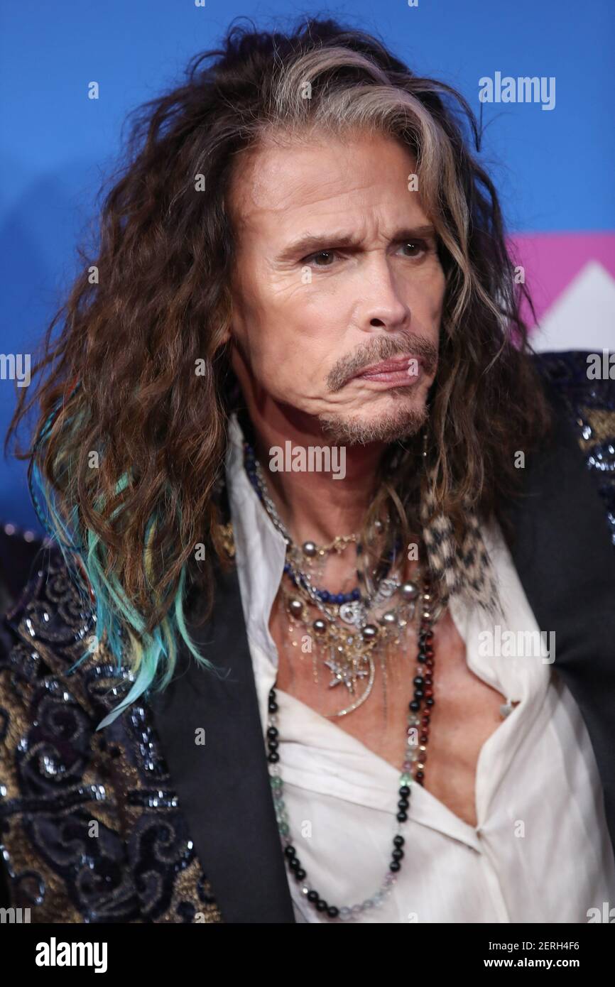 Steven Tyler of Aerosmith walking on the red carpet at The 2018 MTV ...