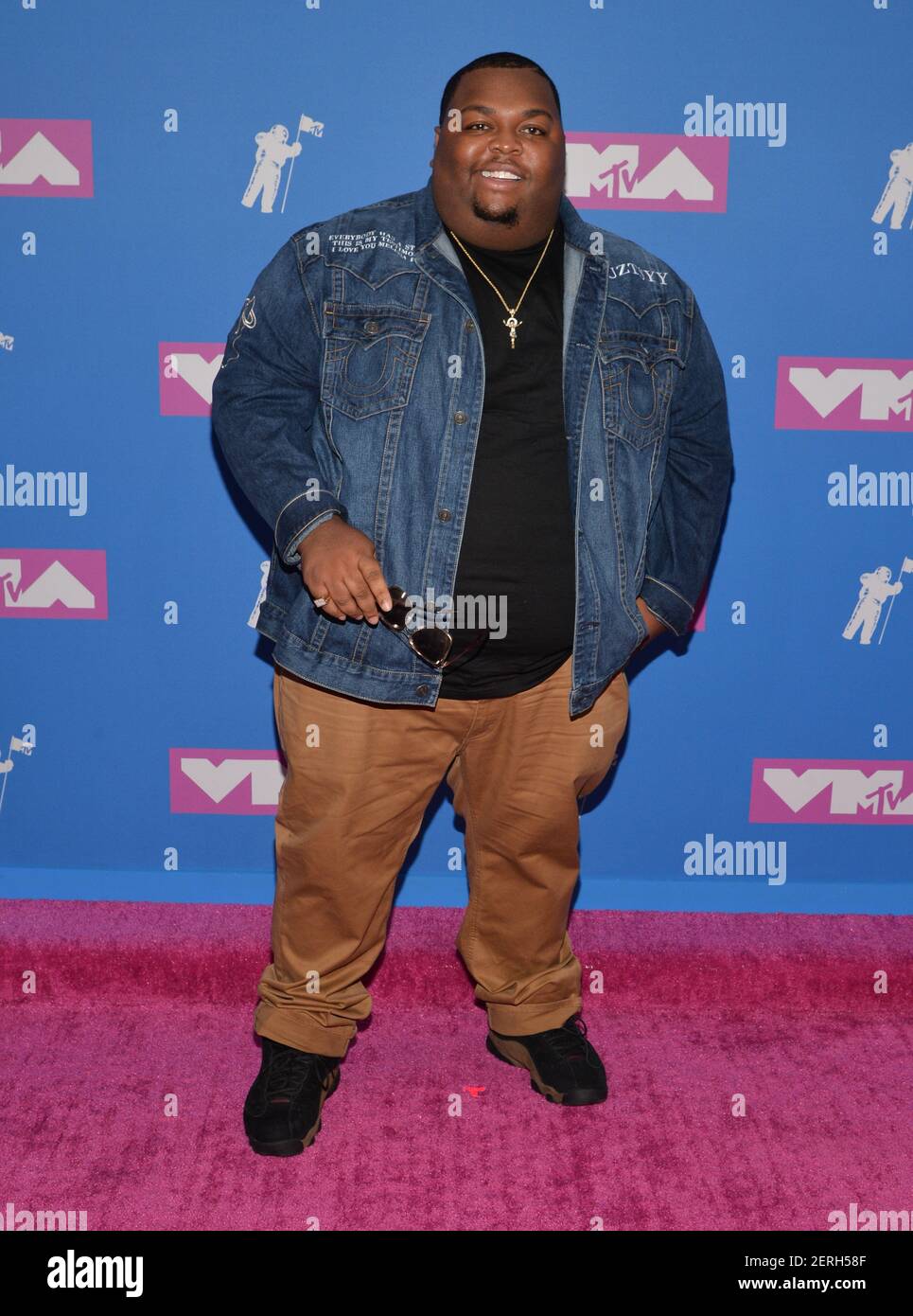 Leonard Ouzts walking on the red carpet at The 2018 MTV Video Music ...