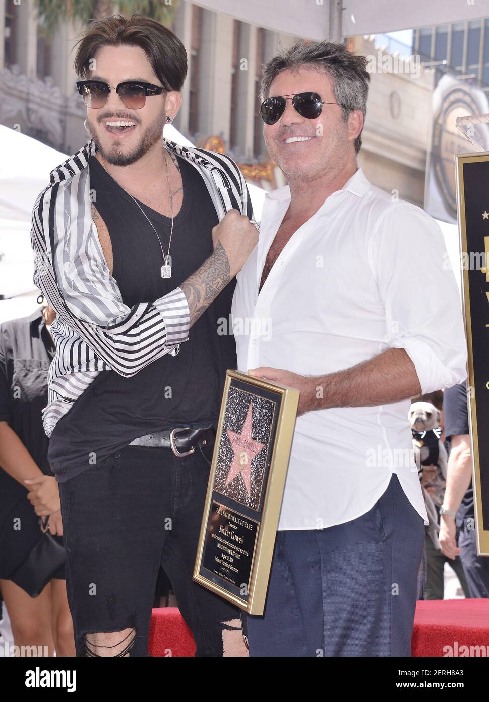 (L-R) Adam Lambert and Simon Cowell at the Simon Cowell Star On The ...