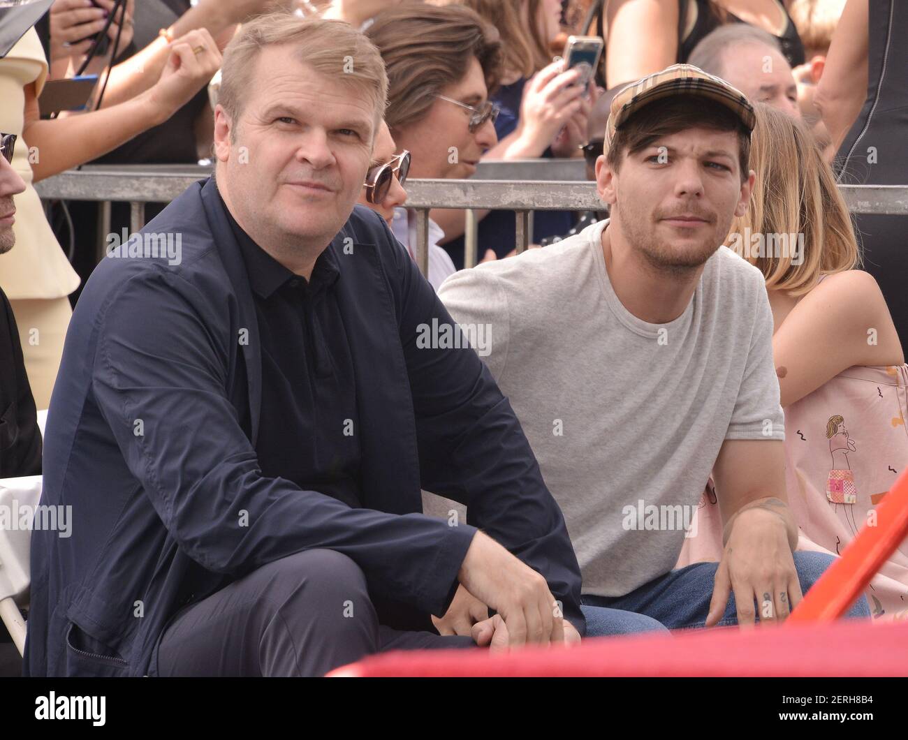 (L-R) Rob Stringer and Louis Tomlinson at the Simon Cowell Star On The ...