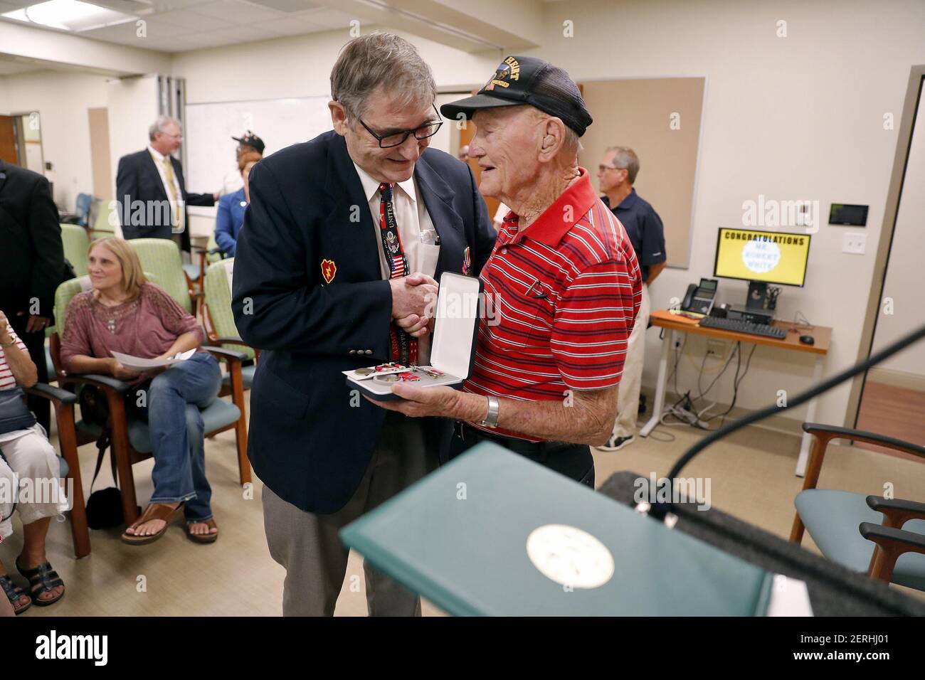 Charles Bohlinger, left, congratulates Robert White after he was ...