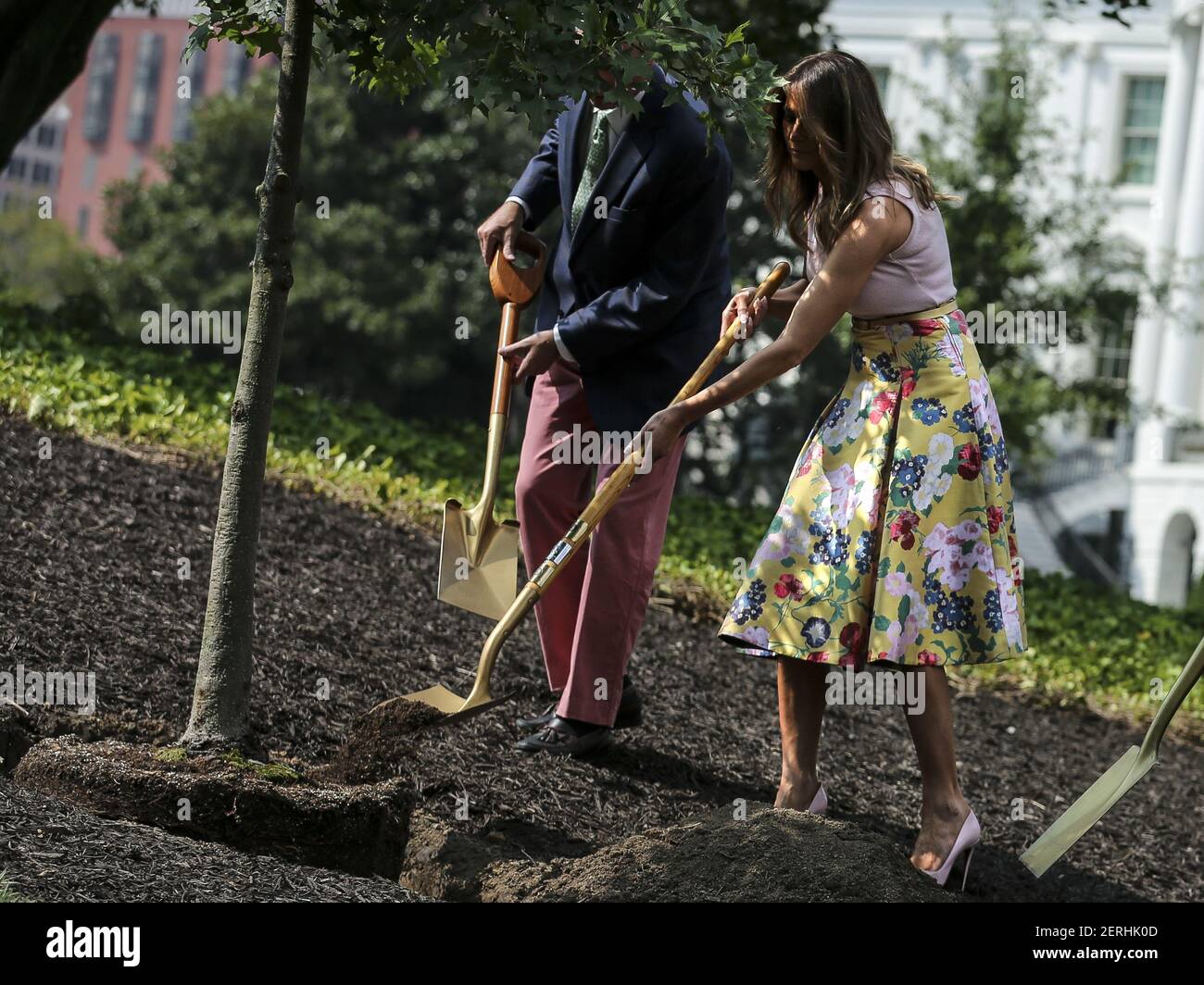 First lady Melania Trump center takes part in a tree planting ceremony ...