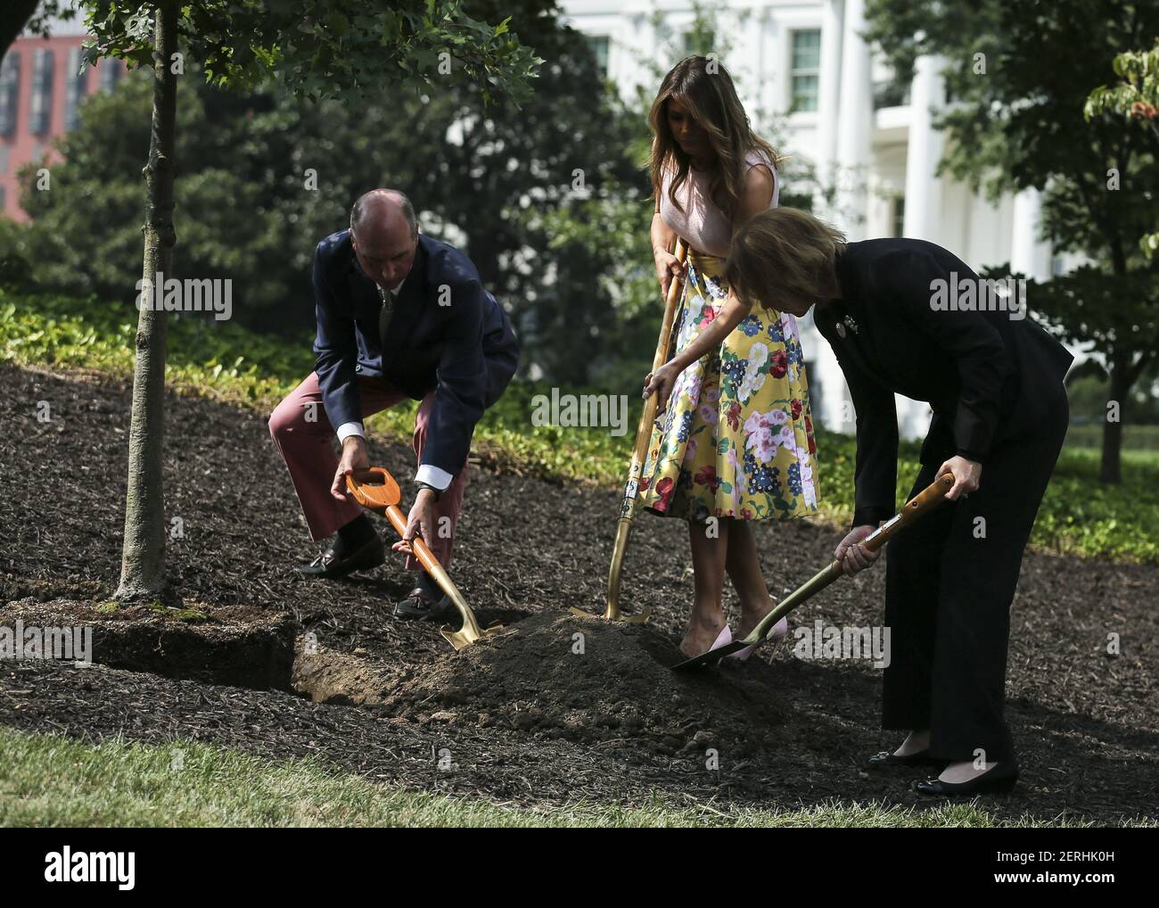 First lady Melania Trump center takes part in a tree planting ceremony ...