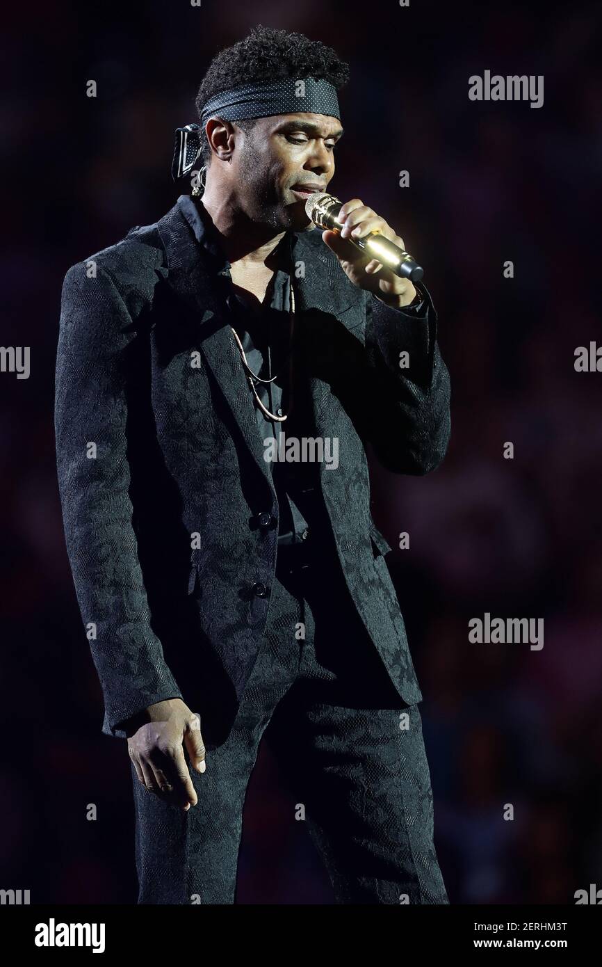Singer-songwriter Maxwell performs the National Anthem during the ...