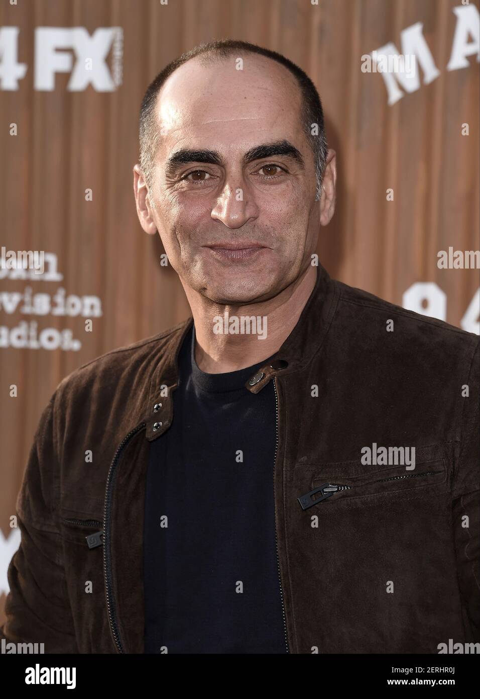 HOLLYWOOD - AUGUST 28: Navid Negahban attends the red carpet premiere ...