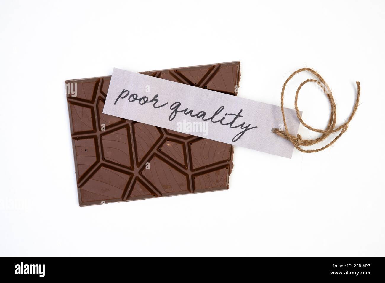 Sweet and delicious whole chocolate bar lies on white background with a ...