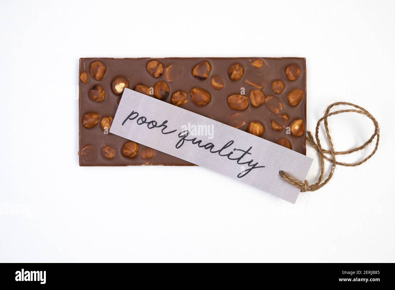 Sweet and delicious whole chocolate bar lies on white background with a ...