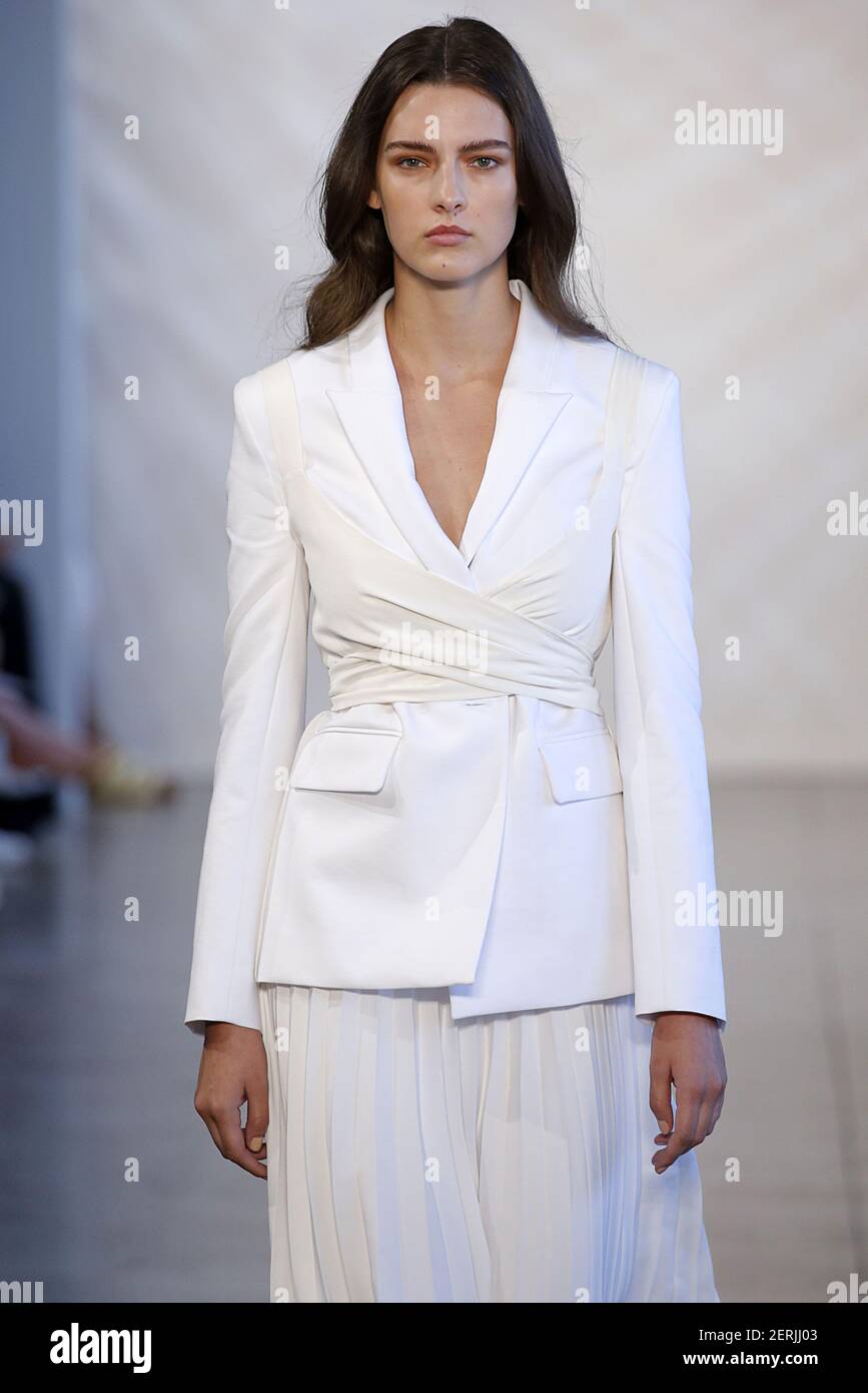 Marie Damian walks on the runway during the noon by noor fashion show ...
