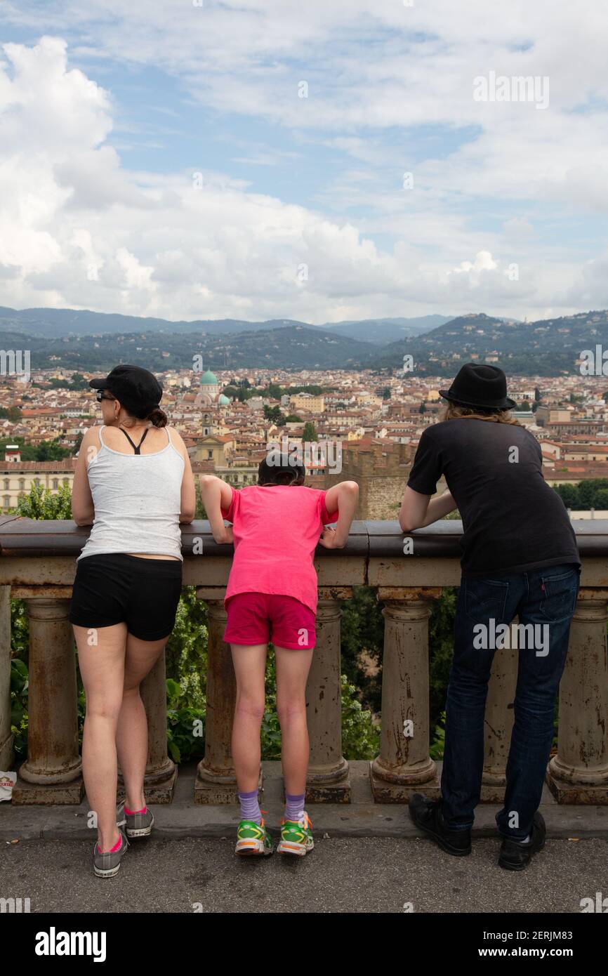Girl looking over railing hi-res stock photography and images - Alamy