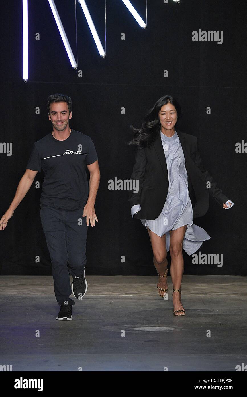 Designers Fernando Garcia and Laura Kim walks on the runway during the ...