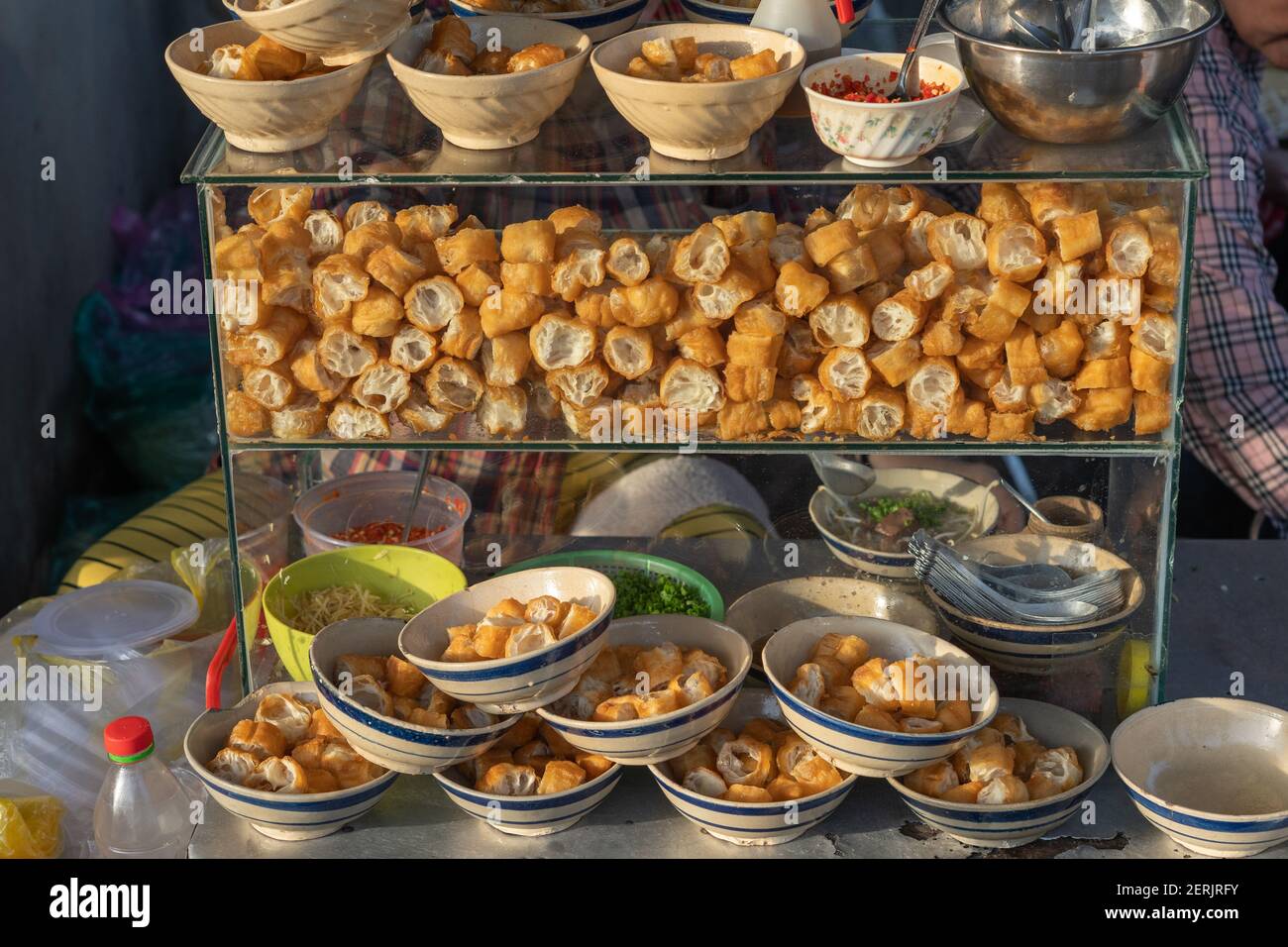 Delicious deep-fried bread sticks- youtiao at breakfast vendor Stock ...