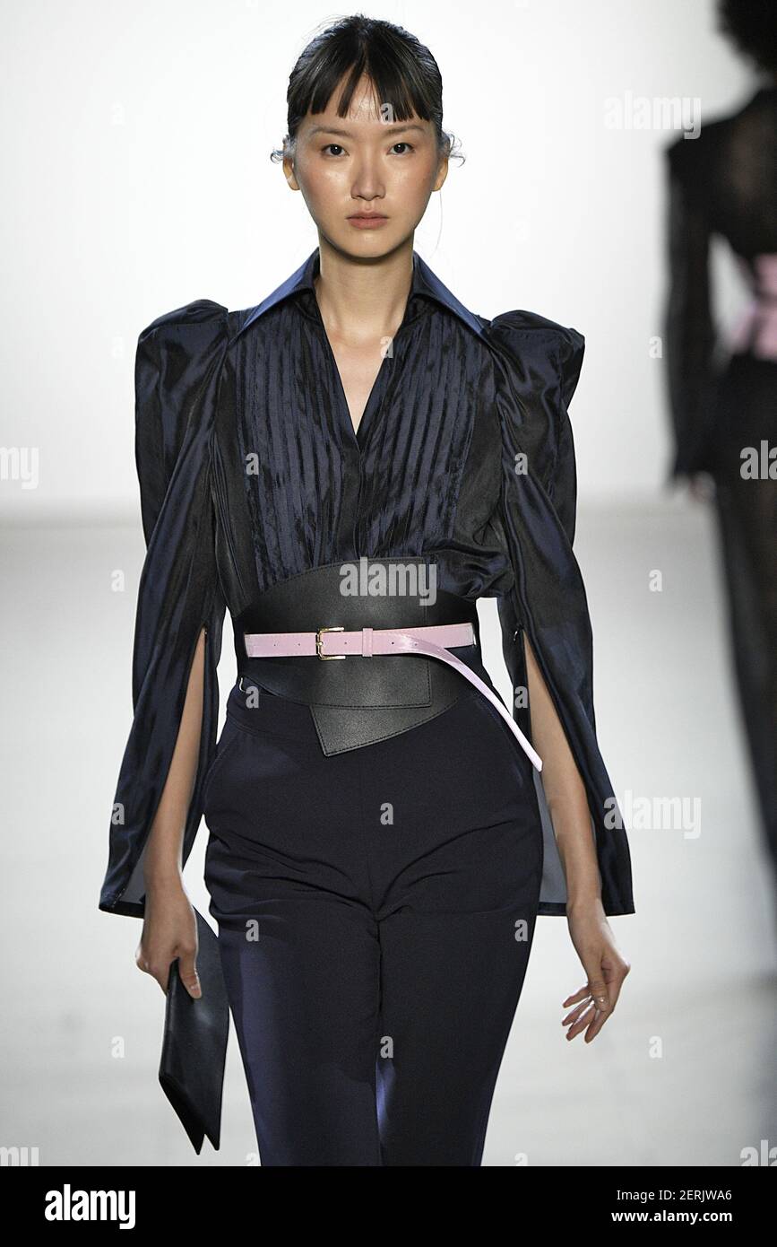 Songhwa Oh walks on the runway during the Taoray Wang Fashion Show ...