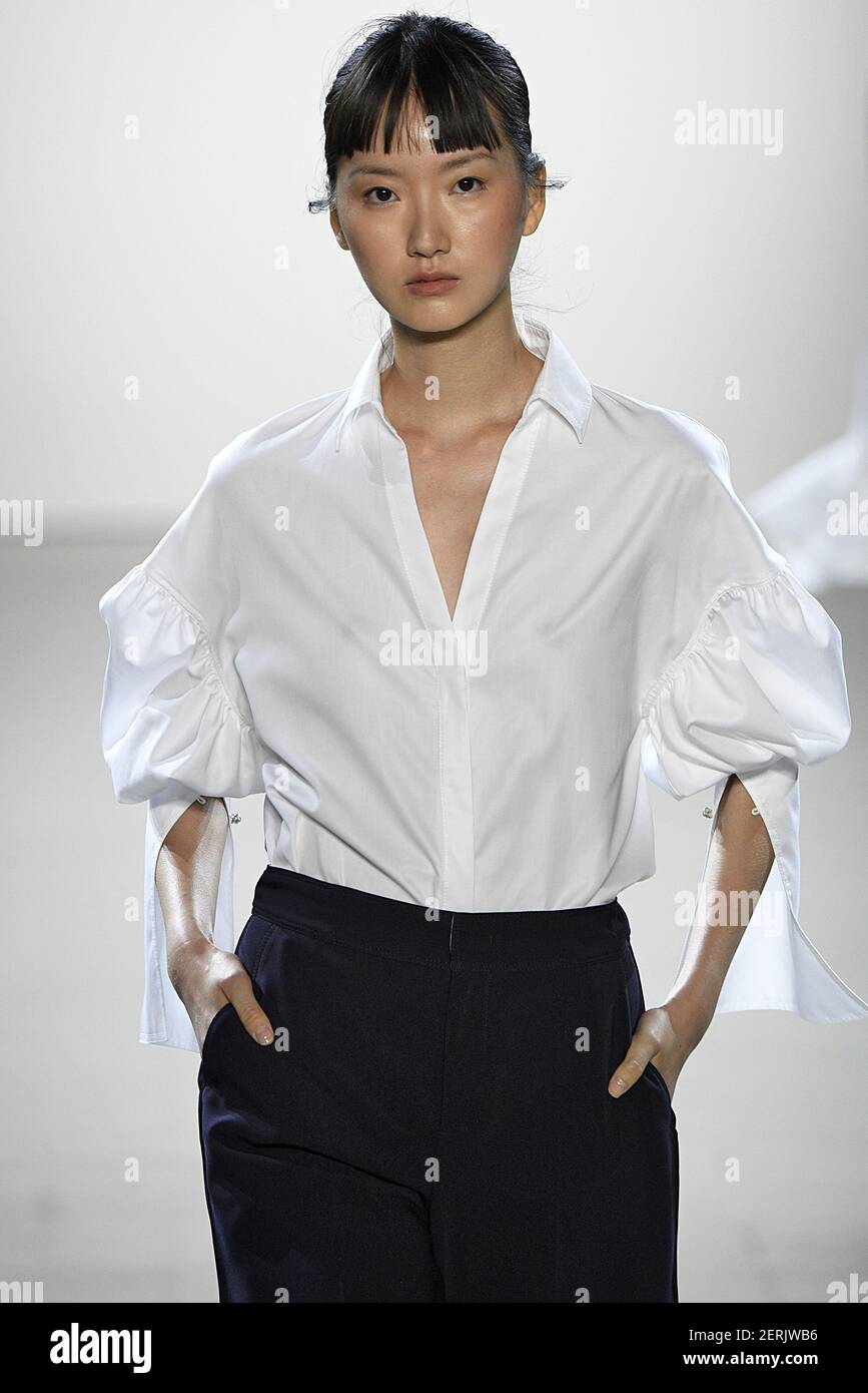 Songhwa Oh walks on the runway during the Taoray Wang Fashion Show ...