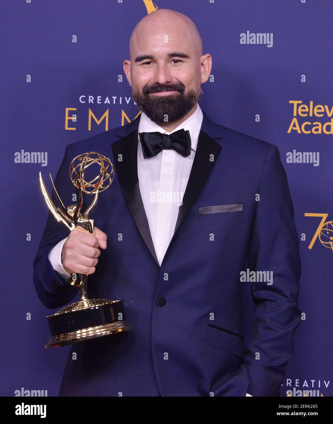 Ryan Barger, winner of the award for outstanding picture editing for ...