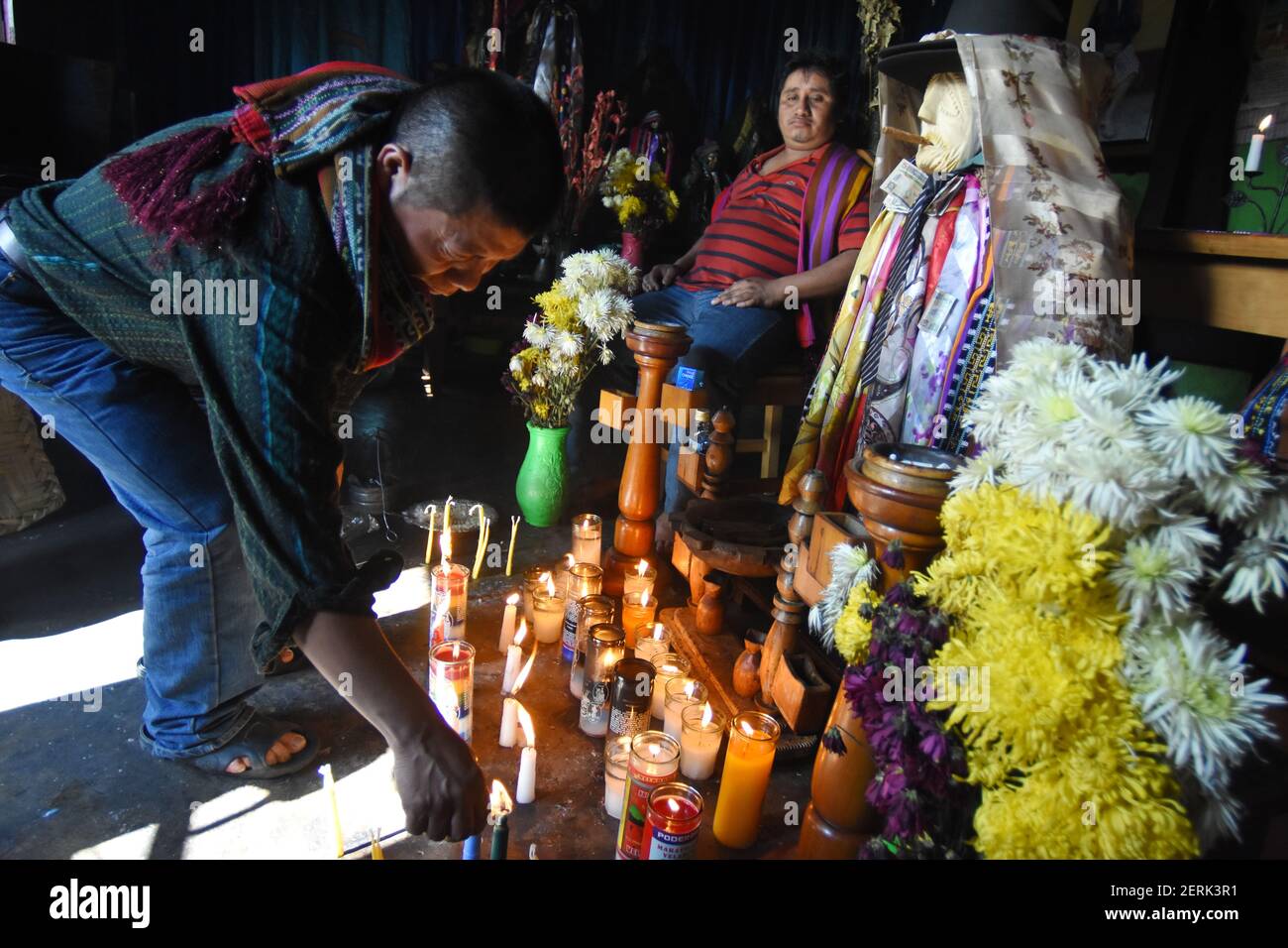 Shaman is seen during a ritual to venerate the holy-God Maya Maximon ...