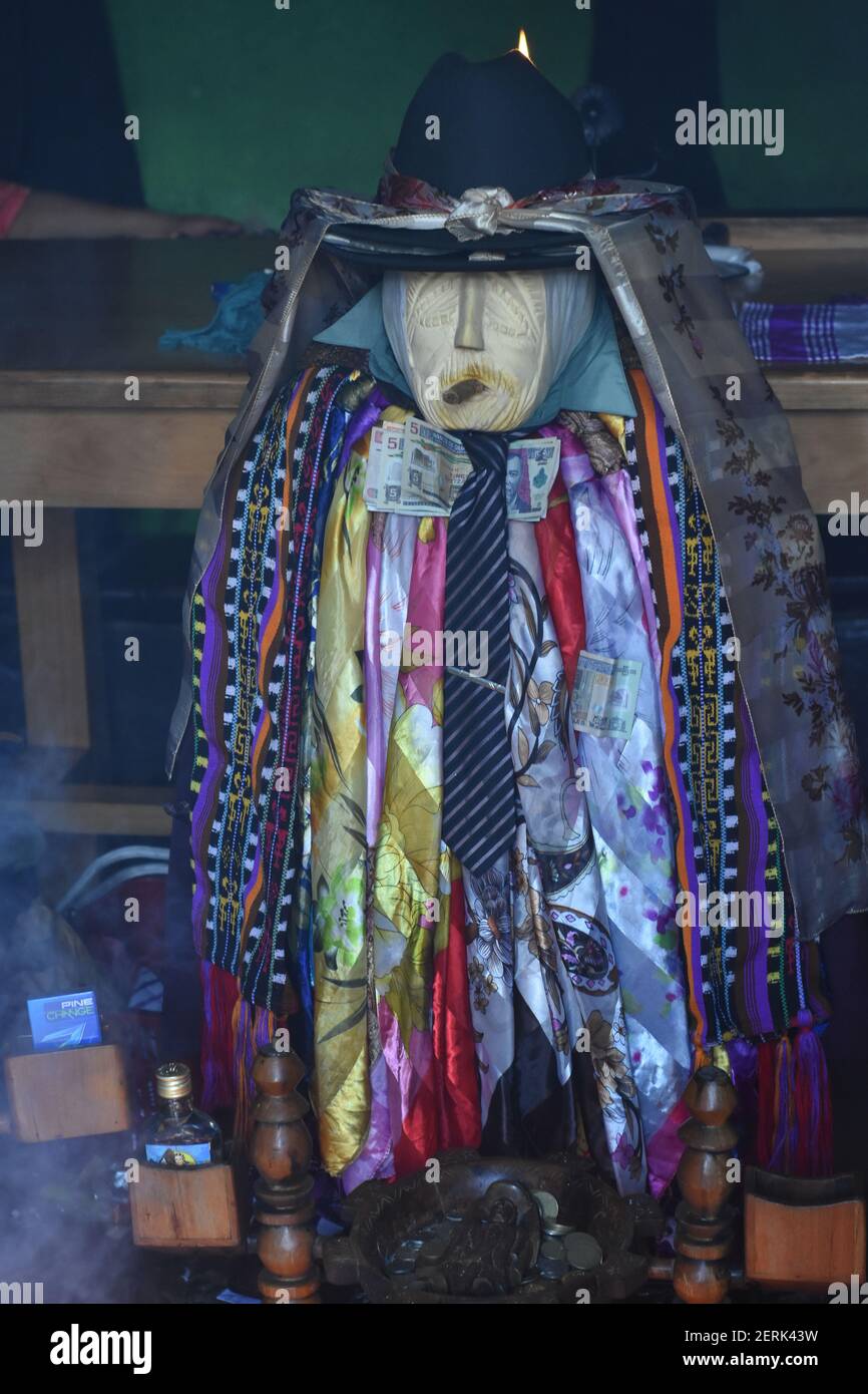 Shaman is seen during a ritual to venerate the holy-God Maya Maximon ...