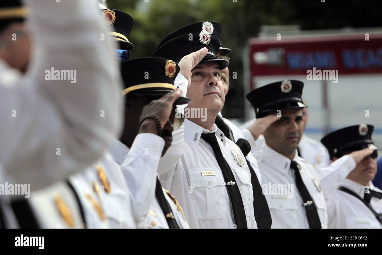 David Cajuso, third from right, of the Miami Beach Fire Department ...