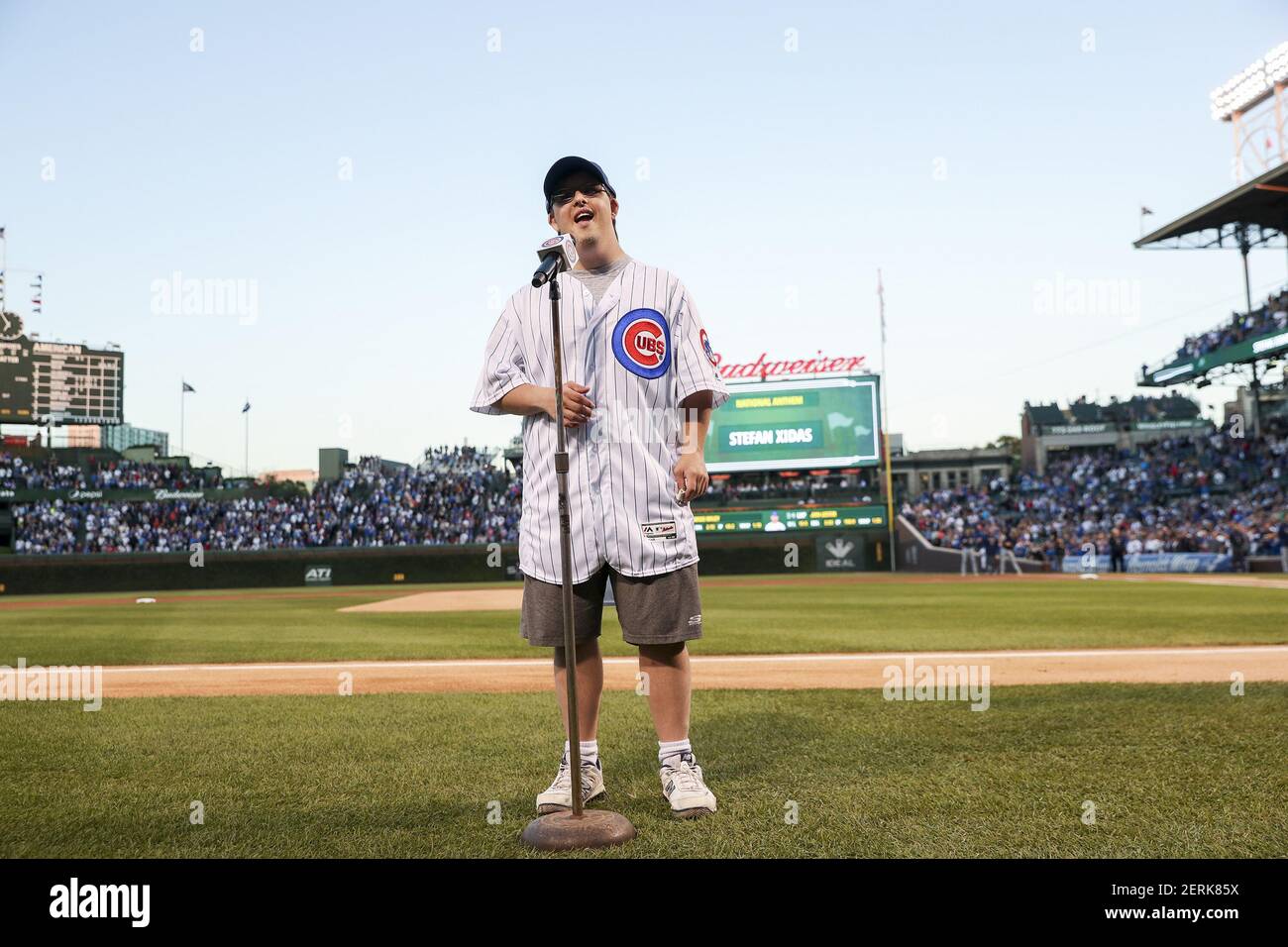 Stefan Xidas sings the national anthem before the Chicago Cubs play the ...