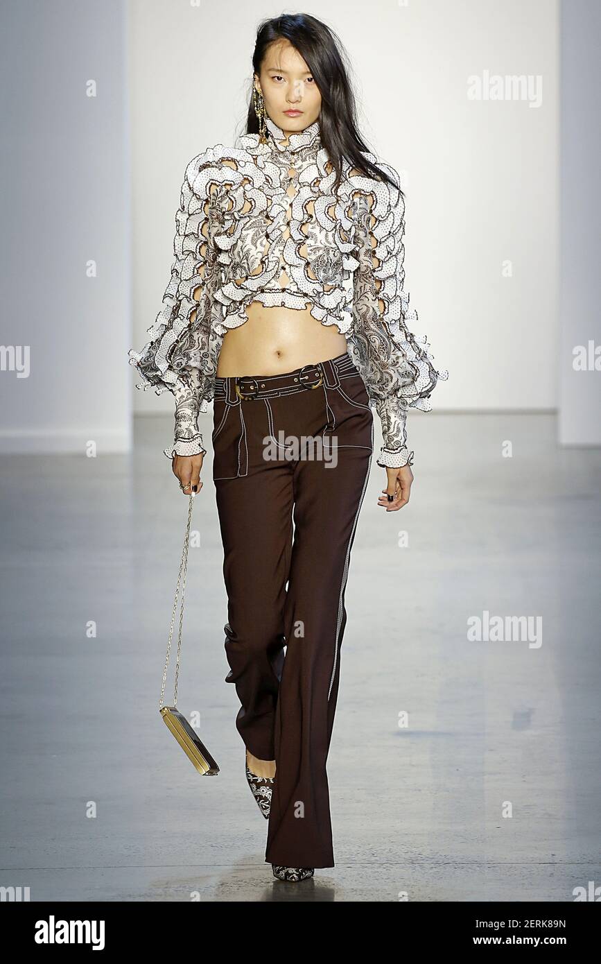Model Liu Chunjie walks on the runway during the Zimmermann Fashion ...