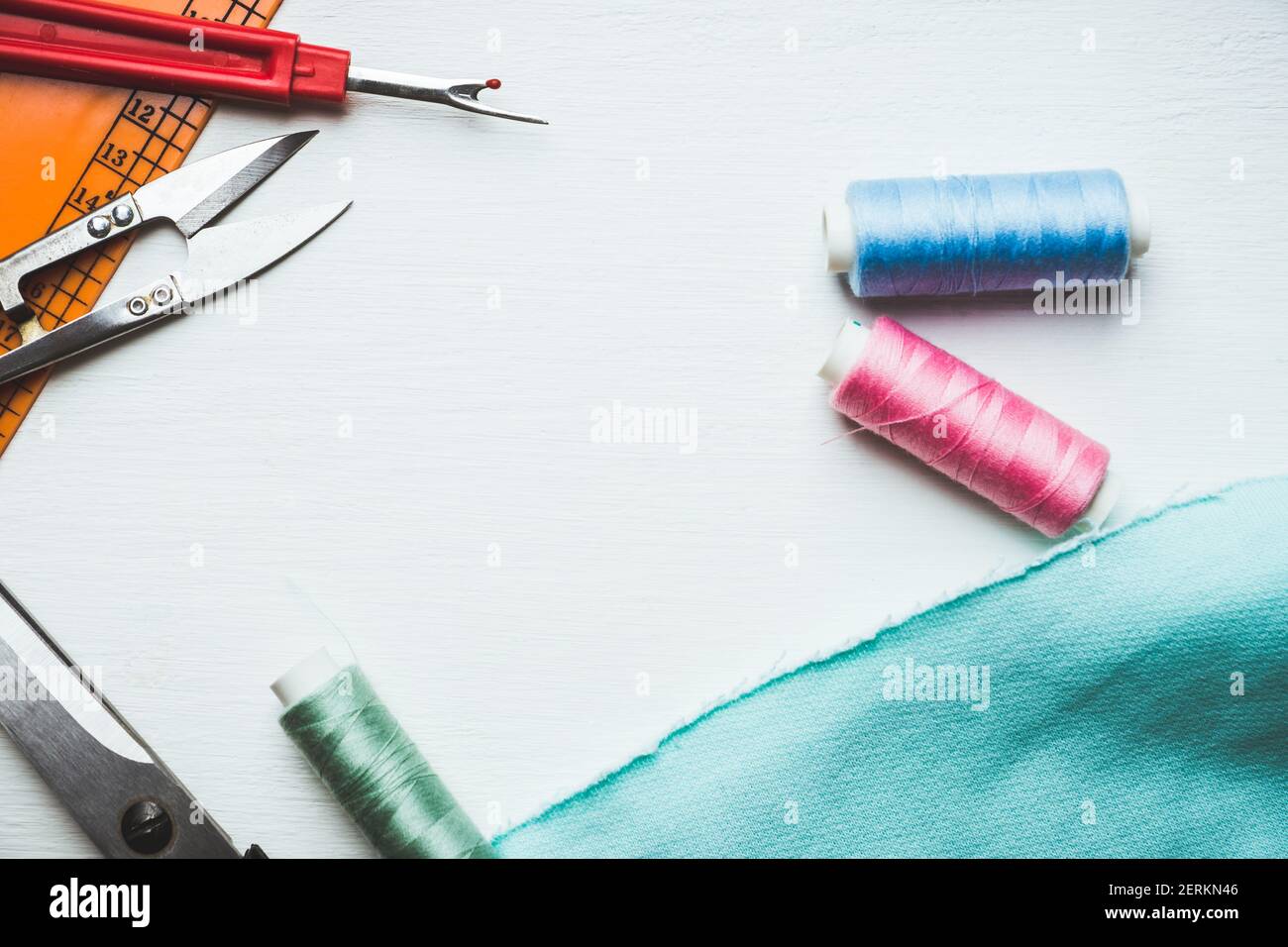 Sewing background with tailor equipment Stock Photo - Alamy