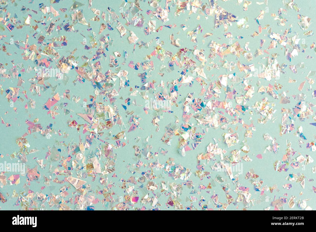 pearl confetti sparkles on blue holiday background. Festive backdrop or ...