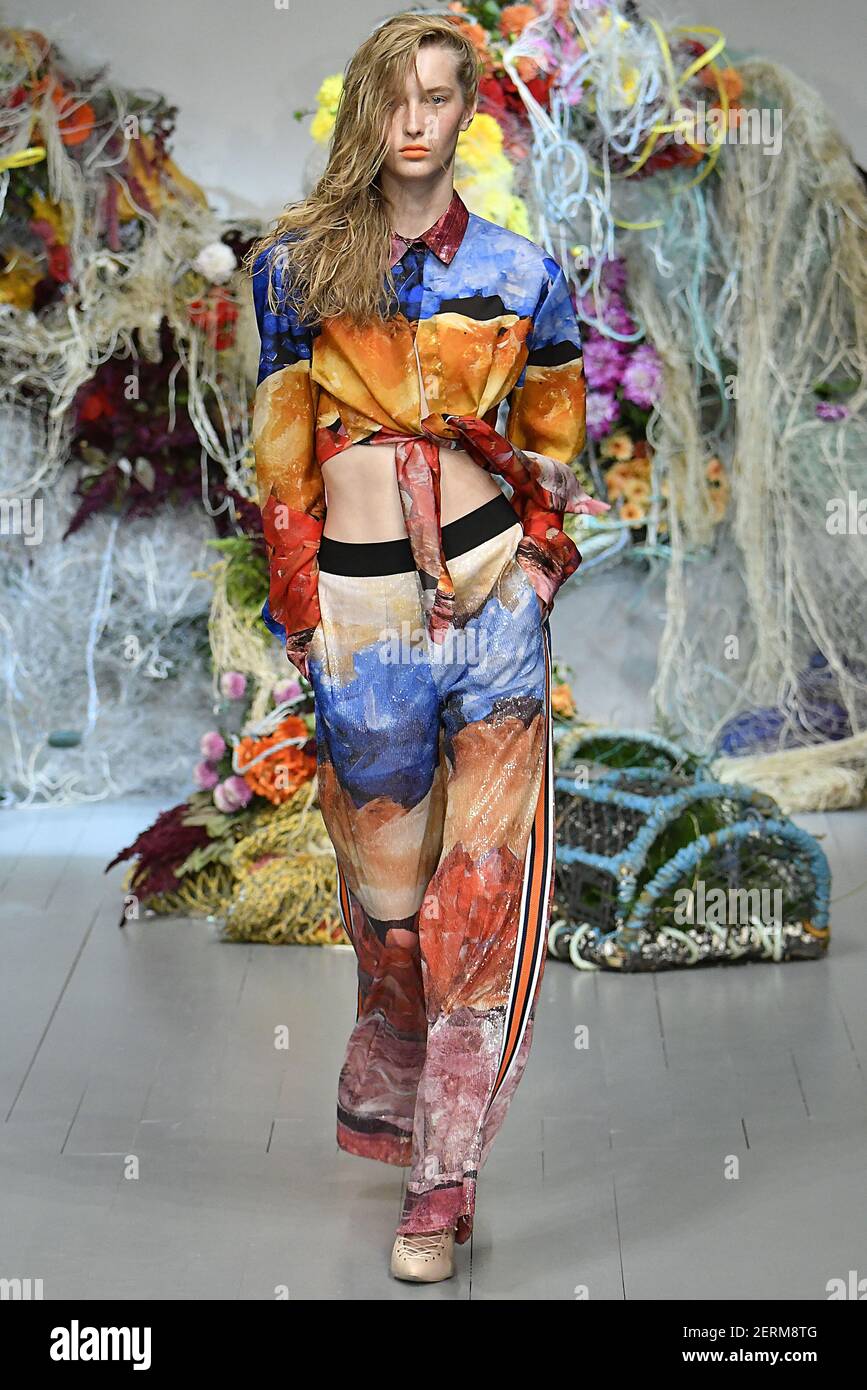 Model walks on the runway during the Fyodor Golan London Fashion Week ...