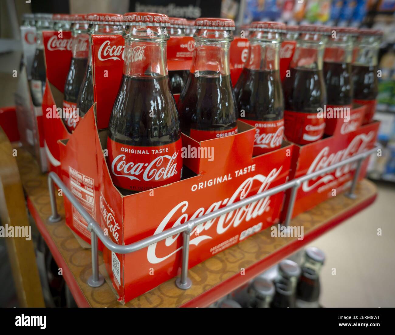 Mini-bottles in six-packs of Coca-Cola in a supermarket in New York on ...