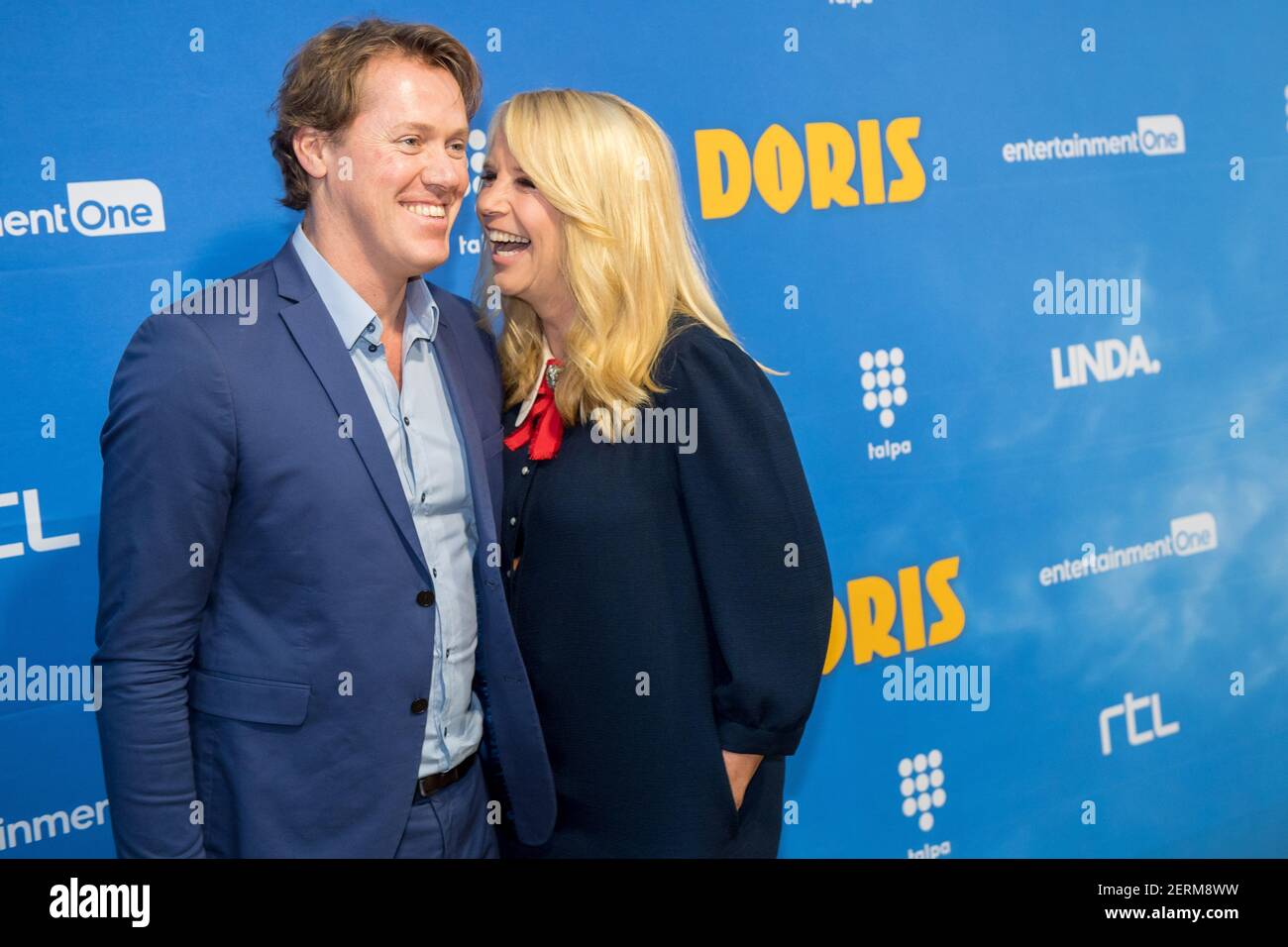 Linda de Mol with her partner Jeroen Rietbergen at the film premiere of ...