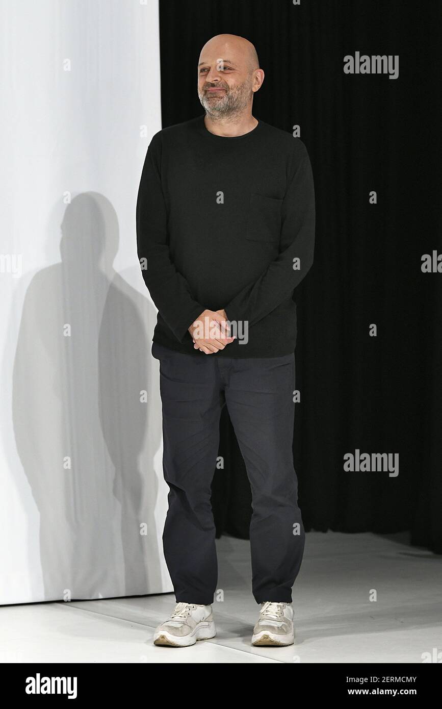 Designer Hussein Chalayan walks on the runway during the Chalayan ...