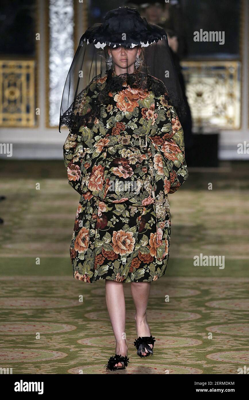Model Sara Grace Wallerstedt walks on the runway during the Simone ...