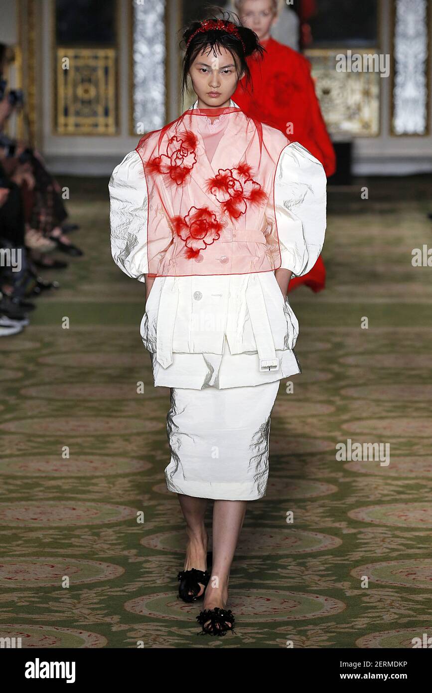 Model He Cong walks on the runway during the Simone Rocha London ...