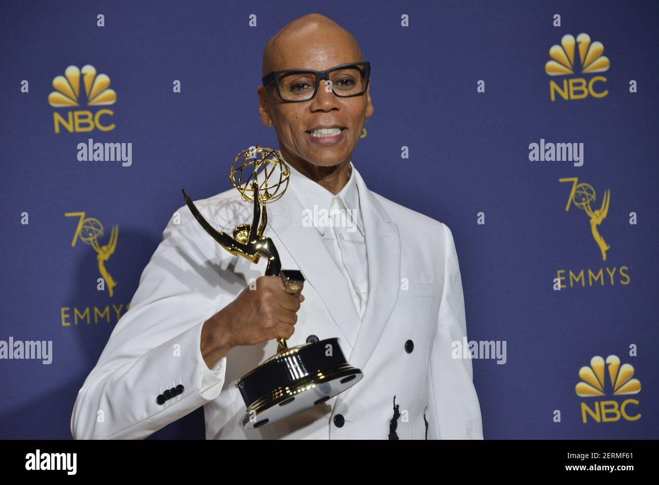RuPaul Charles poses in the press room with the award for outstanding ...