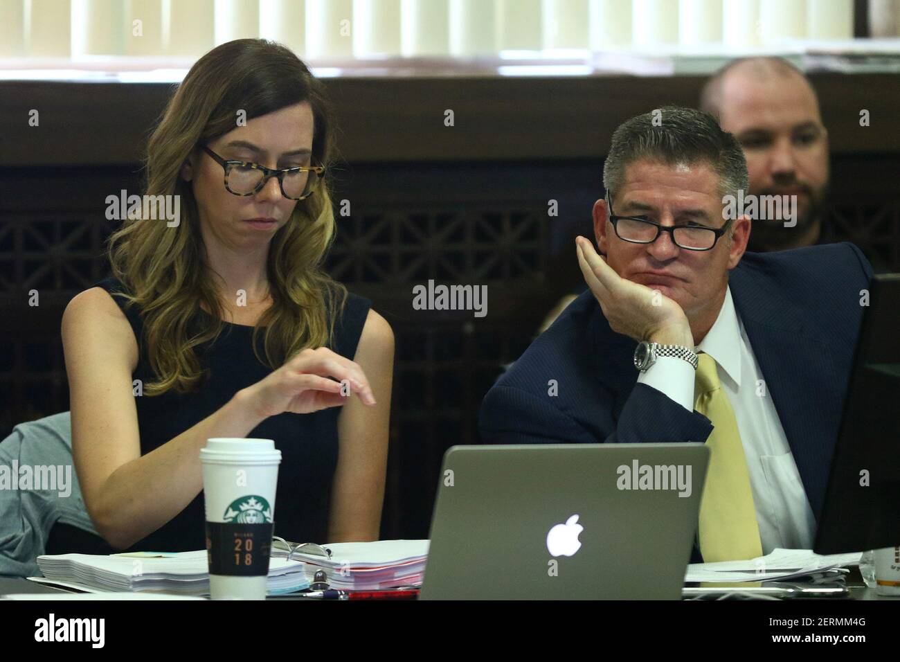 Defense attorneys Elizabeth Fleming and Dan Herbert listen during the ...
