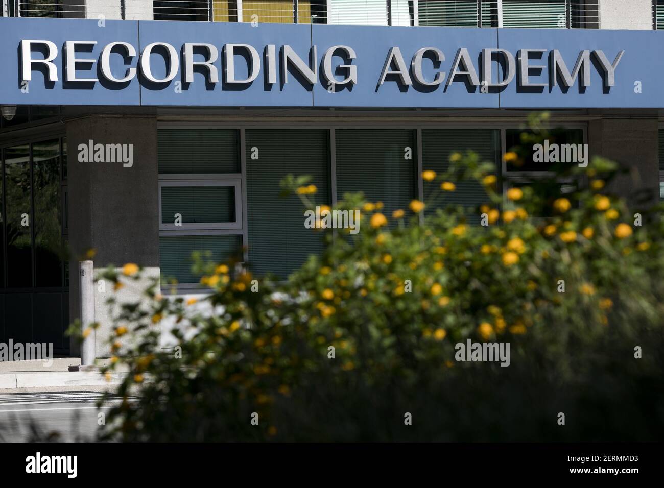 A logo sign outside of the headquarters of The Recording Academy in ...