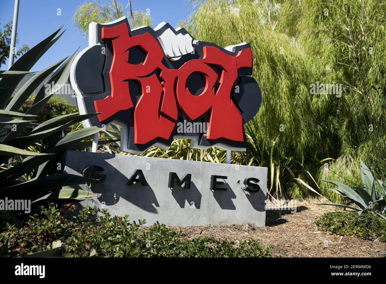 A logo sign outside of the headquarters of Riot Games, Inc., in Los ...