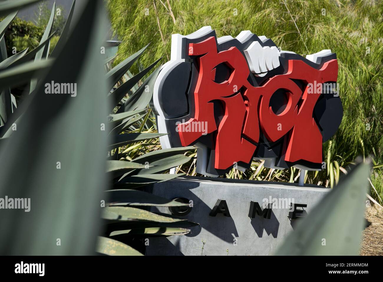 A logo sign outside of the headquarters of Riot Games, Inc., in Los ...