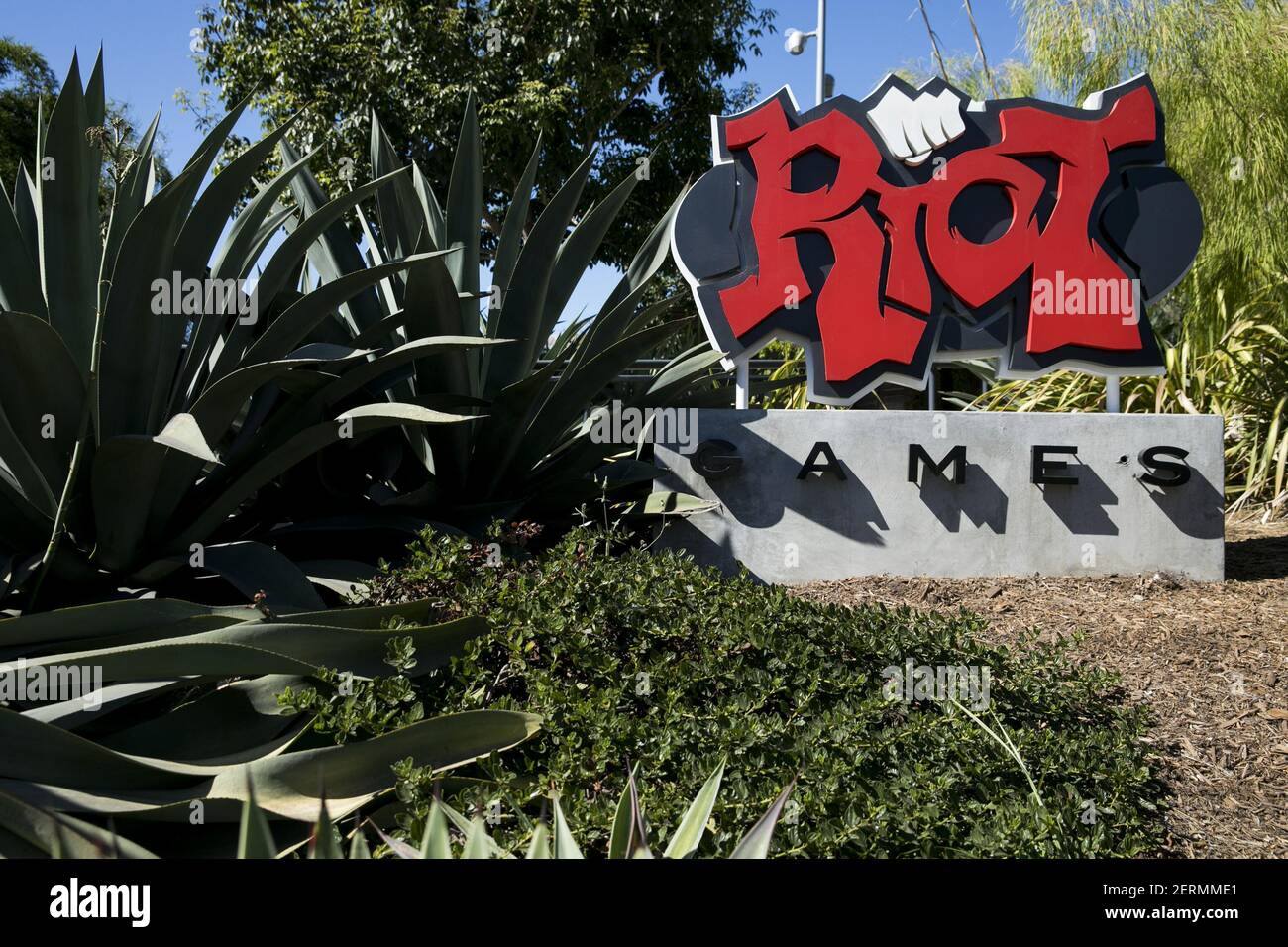 A logo sign outside of the headquarters of Riot Games, Inc., in Los ...